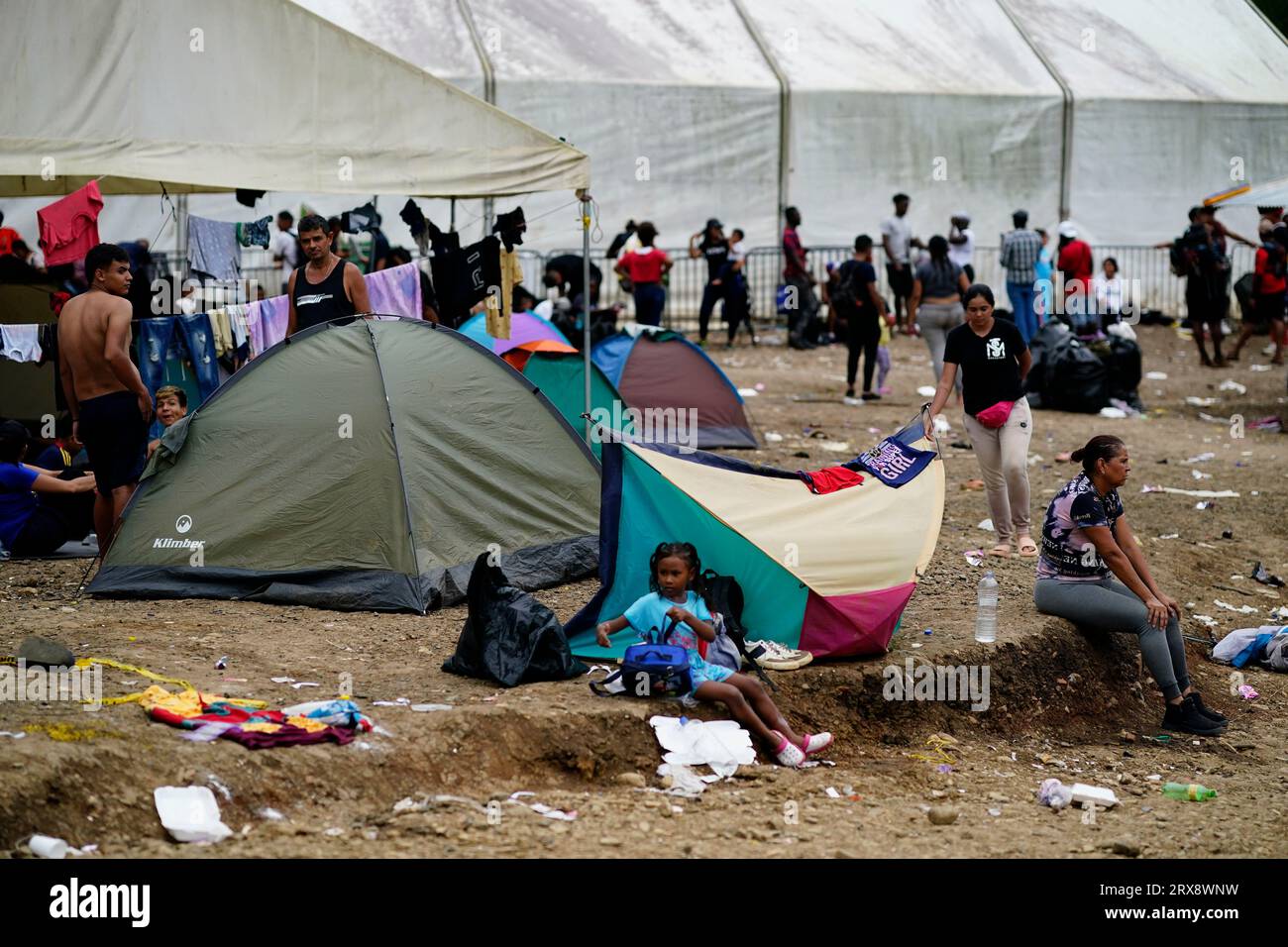 Migrants trying to reach the United States, rest at a makeshift camp in ...