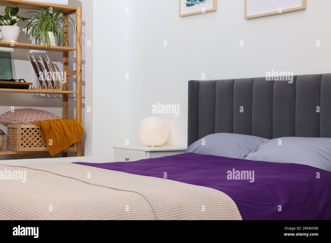 Comfortable bed and different decor in bedroom. Interior design Stock ...