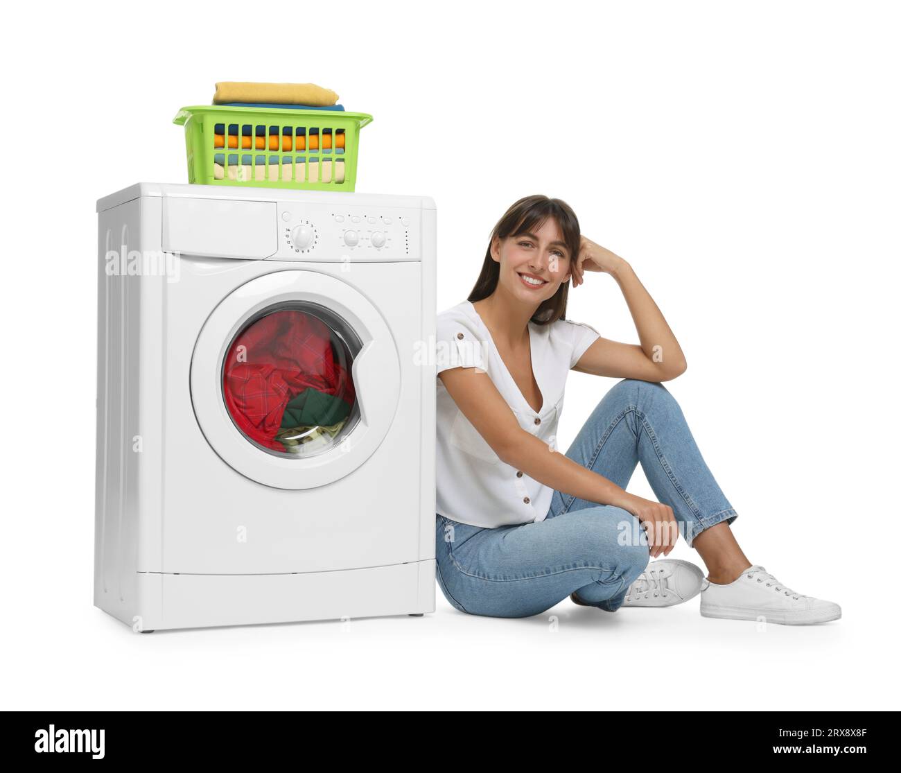 Woman sitting on washing machine hi-res stock photography and images ...