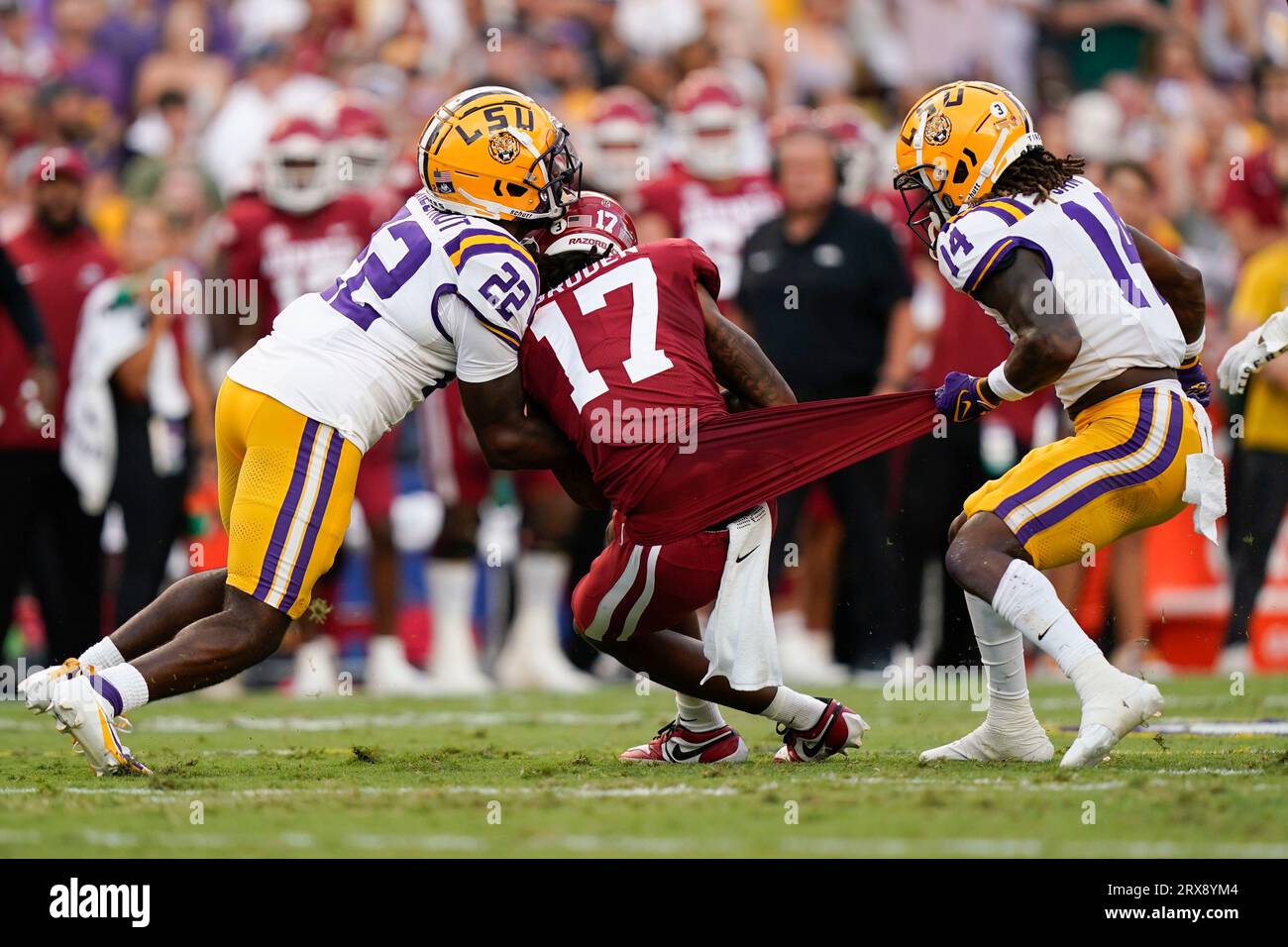 Arkansas wide receiver Tyrone Broden (17) is tackled by LSU cornerback ...