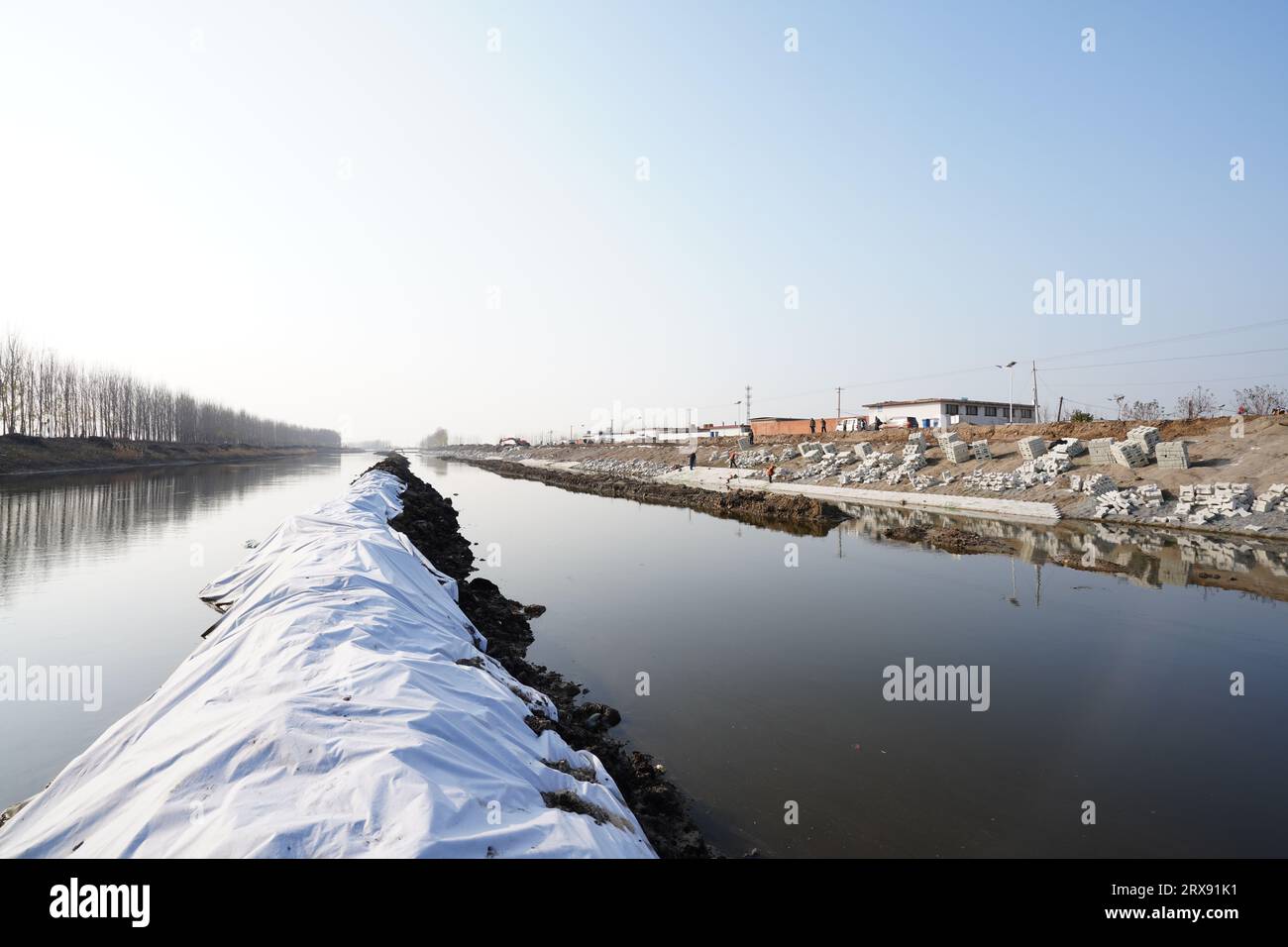 Water conservancy project construction site on the bank of the canal ...