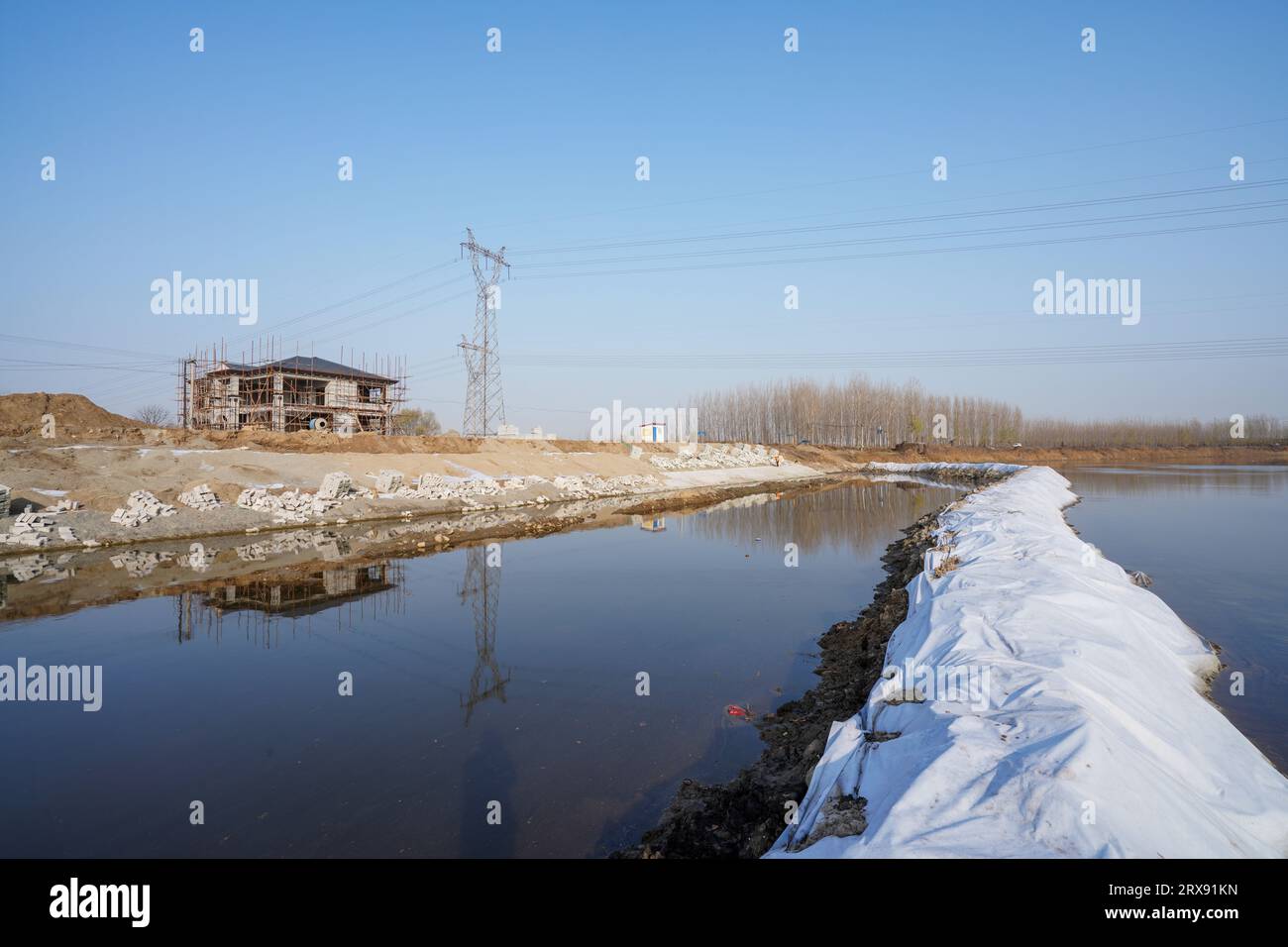 Water conservancy project construction site on the bank of the canal ...
