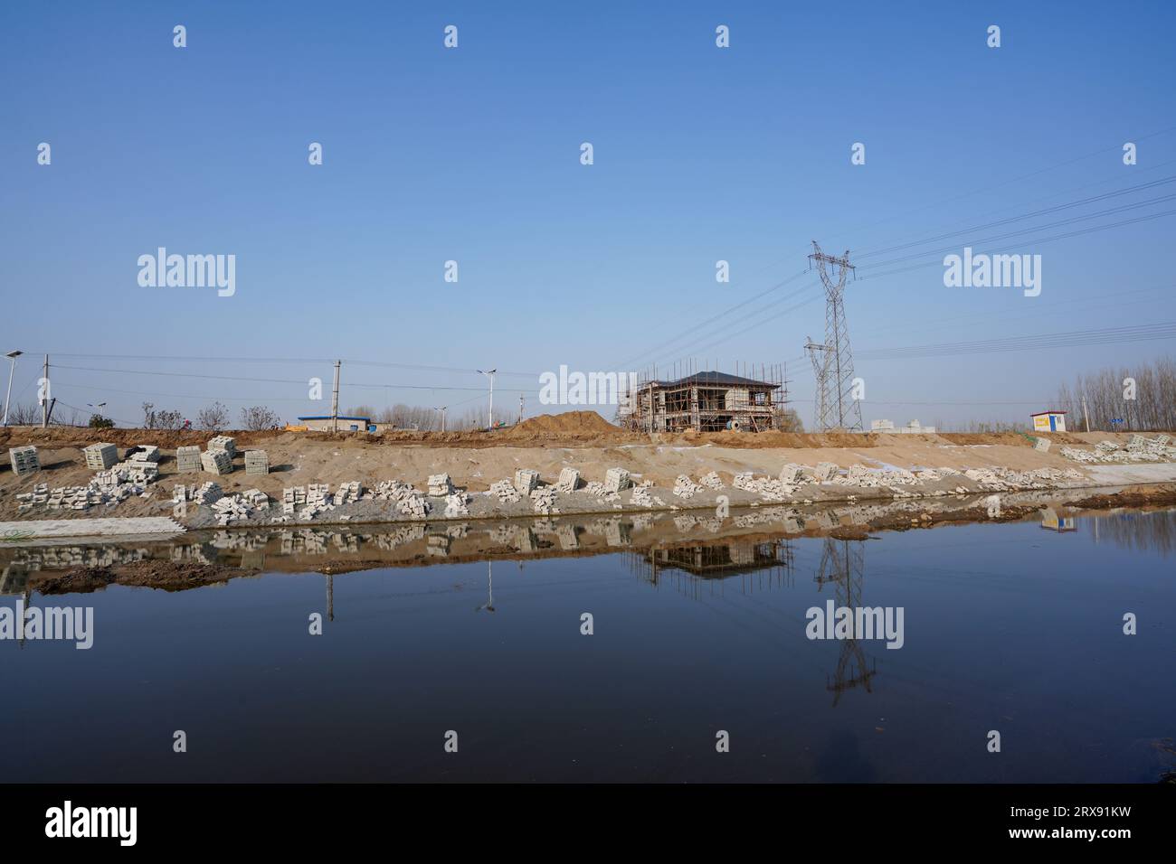 Water conservancy project construction site on the bank of the canal ...