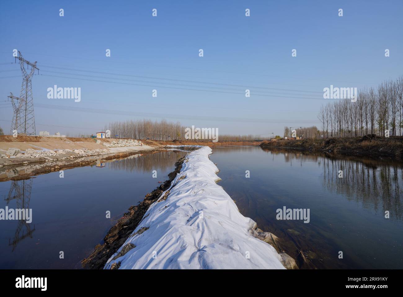 Water conservancy project construction site on the bank of the canal ...