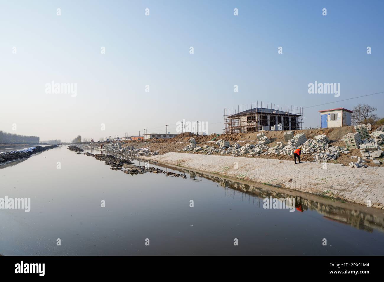 Water conservancy project construction site on the bank of the canal ...