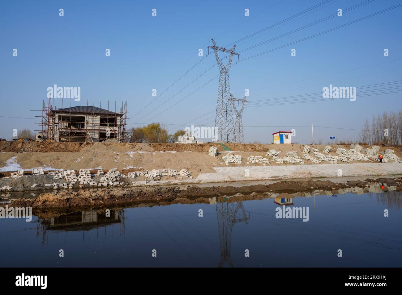 Water conservancy project construction site on the bank of the canal ...