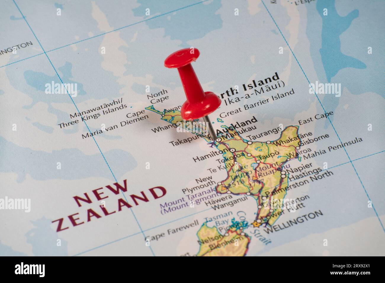 A red push in placed on a map locating New Zealand Stock Photo - Alamy