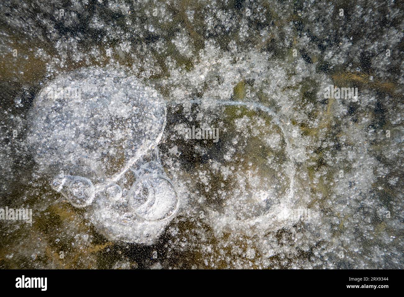 Bubbles in the ice layer, close-up photo Stock Photo - Alamy