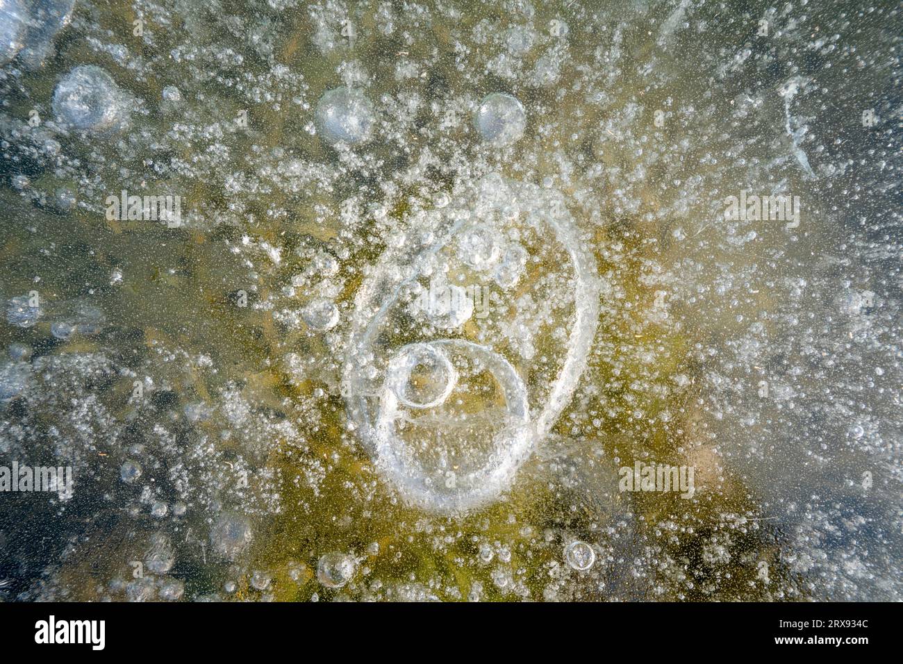 Bubbles in the ice layer, close-up photo Stock Photo - Alamy