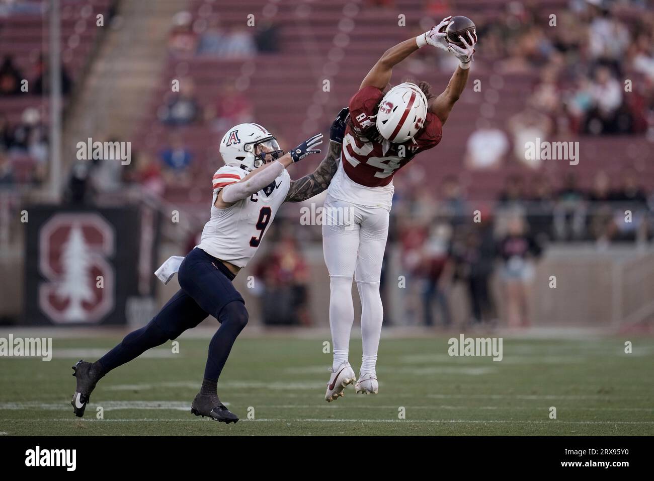 Stanford wide receiver Tiger Bachmeier, right, catches a pass while ...