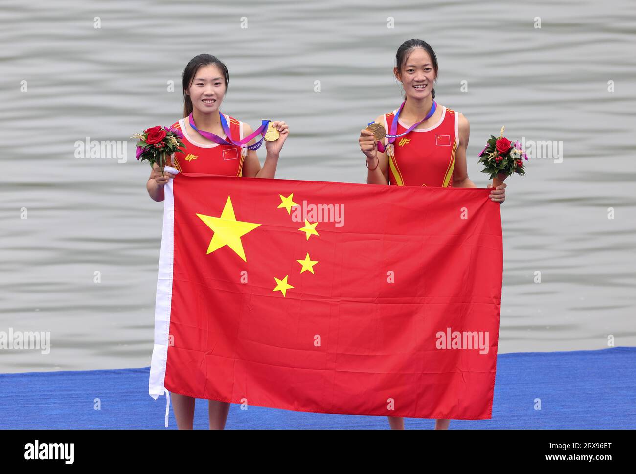 Hangzhou, China's Zhejiang Province. 24th Sep, 2023. Zou Jiaqi (L) and ...