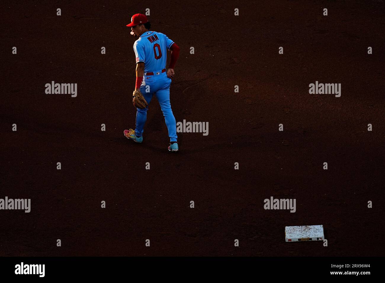 St. Louis Cardinals shortstop Masyn Winn blows a bubble during the ...