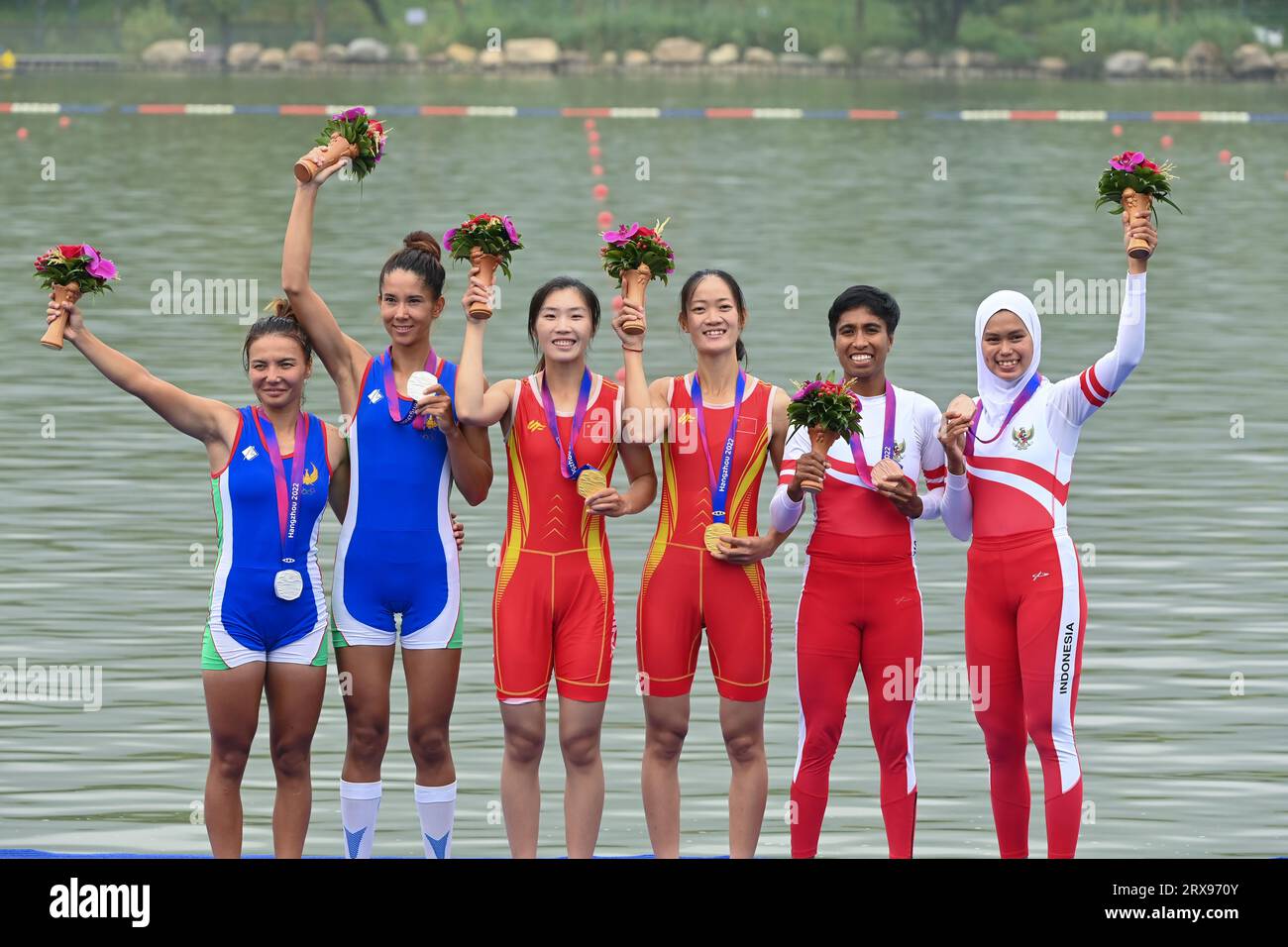Hangzhou, China's Zhejiang Province. 24th Sep, 2023. Gold medalists Zou ...