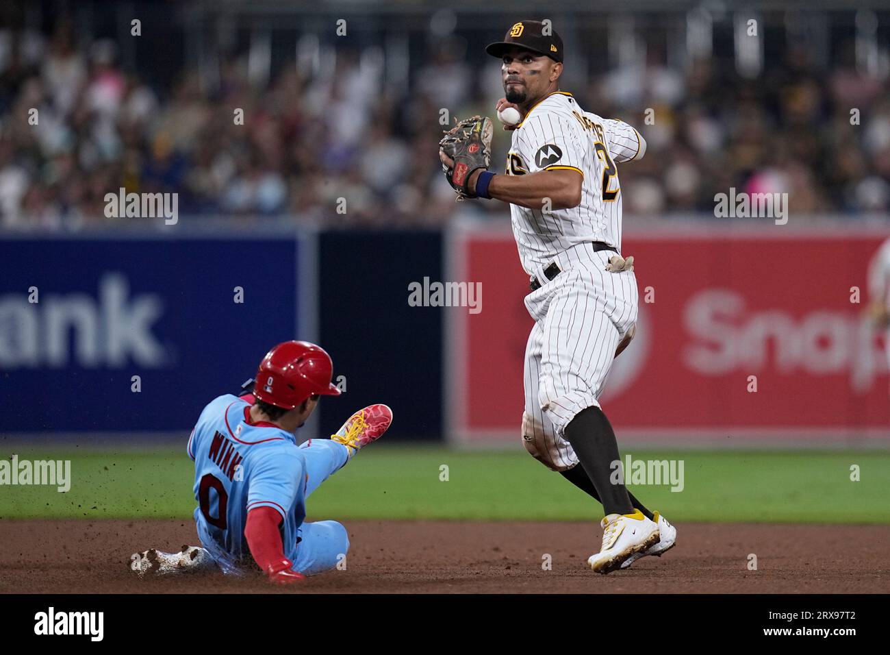 San Diego Padres shortstop Xander Bogaerts, right, throws to first for ...
