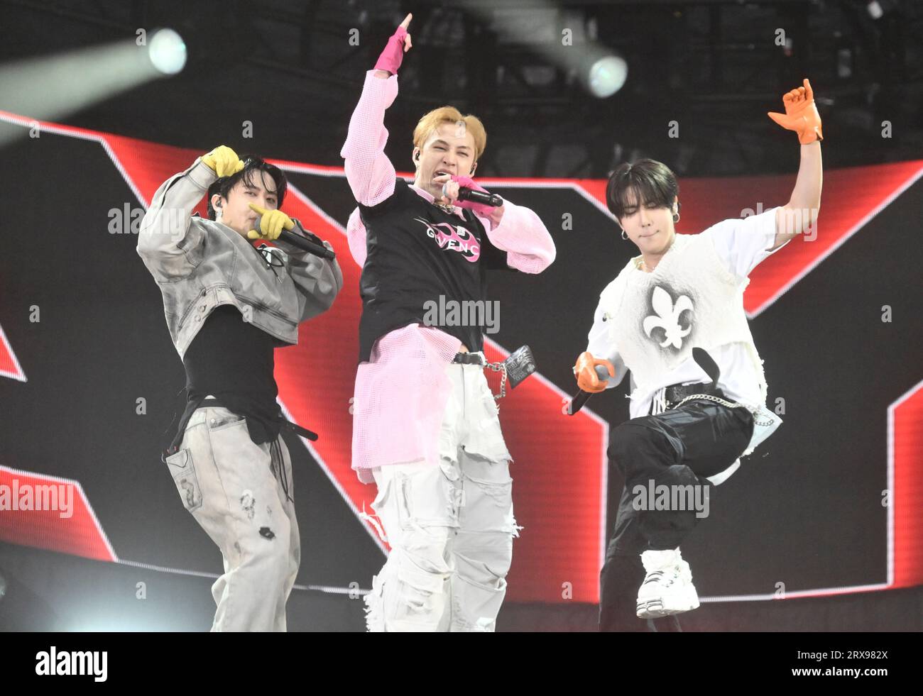 Changbin, from left, Bang Chan and Han of 3RACHA perform during the ...