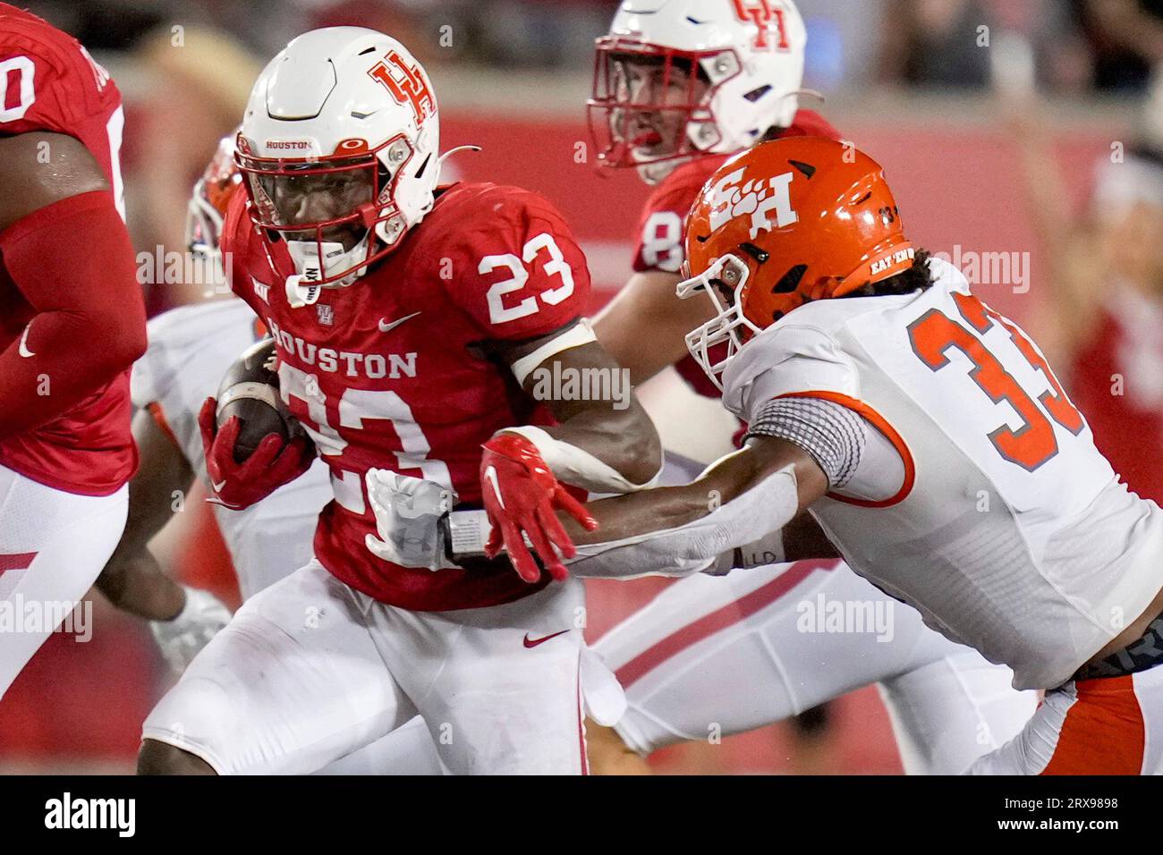 Houston running back Parker Jenkins (23) rushes as Sam Houston State ...