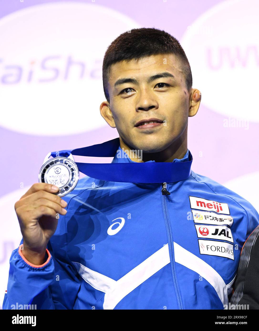 Kenichiro Fumita of Japan poses after winning silver in the men's Greco ...