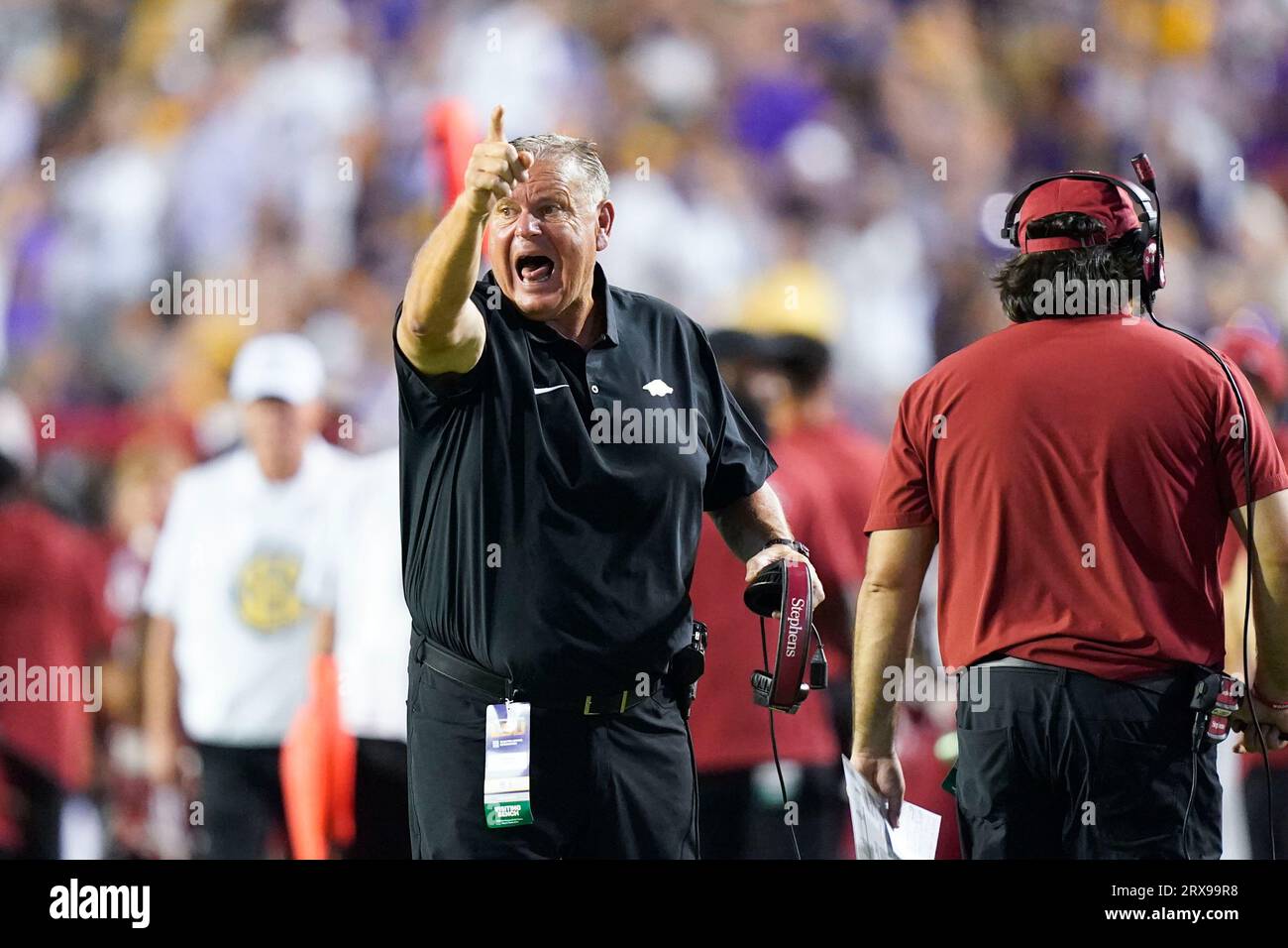 Arkansas head coach Sam Pittman calls out from the sideline in the ...