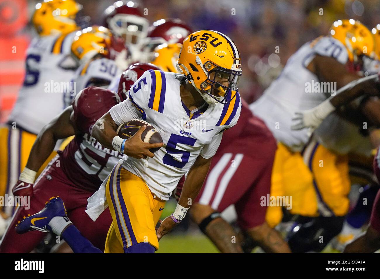 LSU quarterback Jayden Daniels (5) carries on a keeper in the second ...