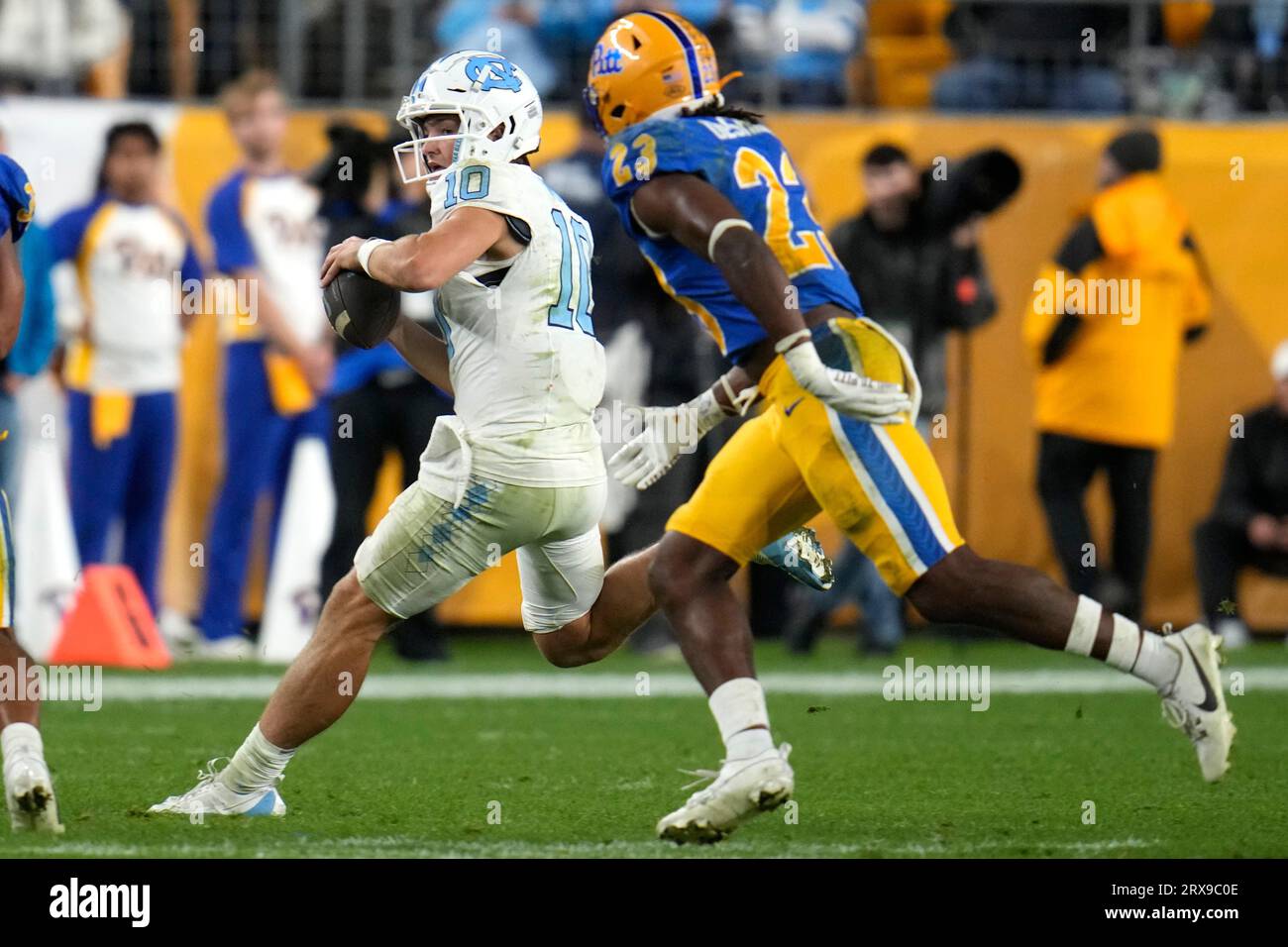 North Carolina quarterback Drake Maye (10) looks to pass under pressure ...