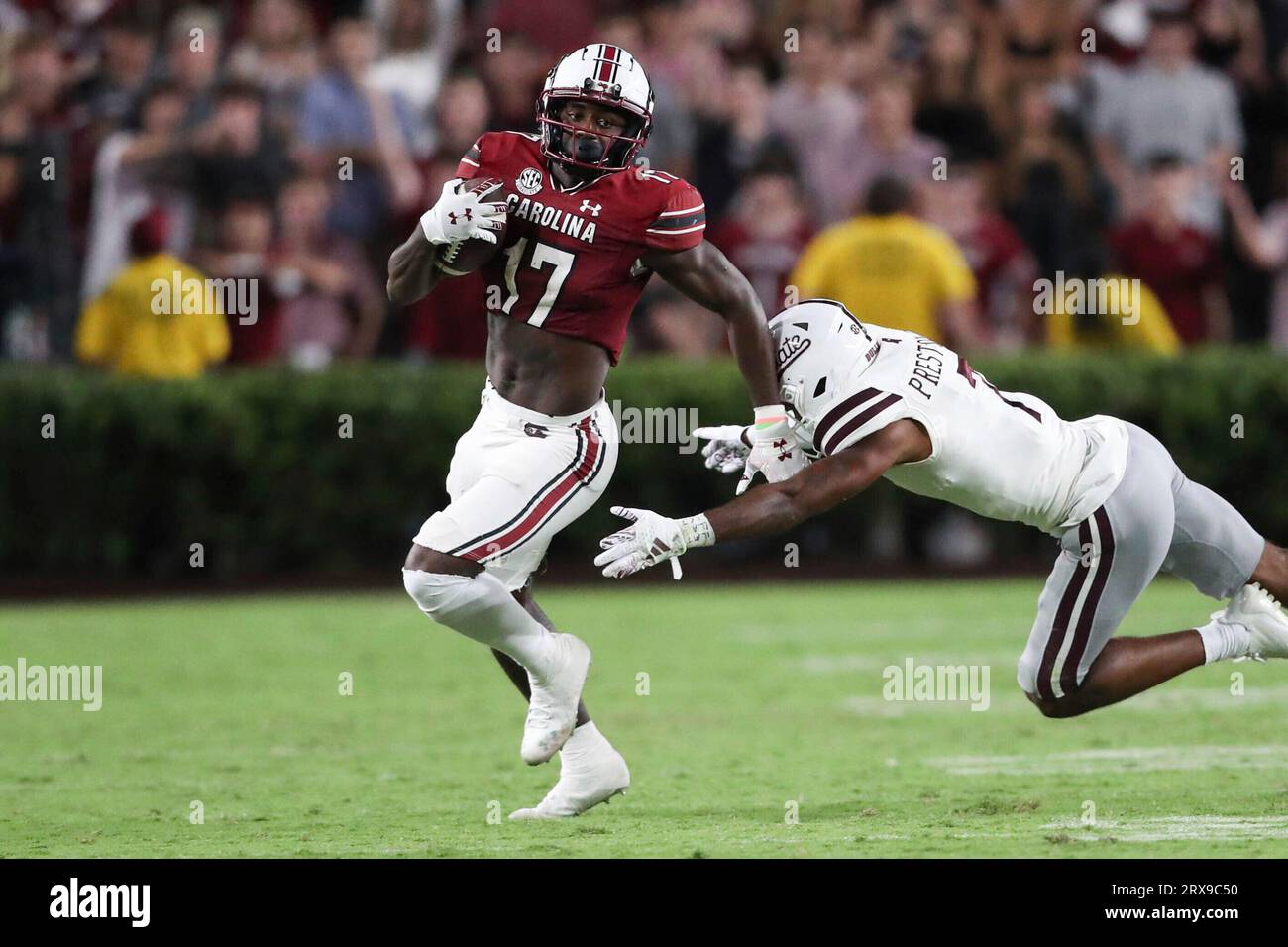 South Carolina wide receiver Xavier Legette (17) runs away from ...