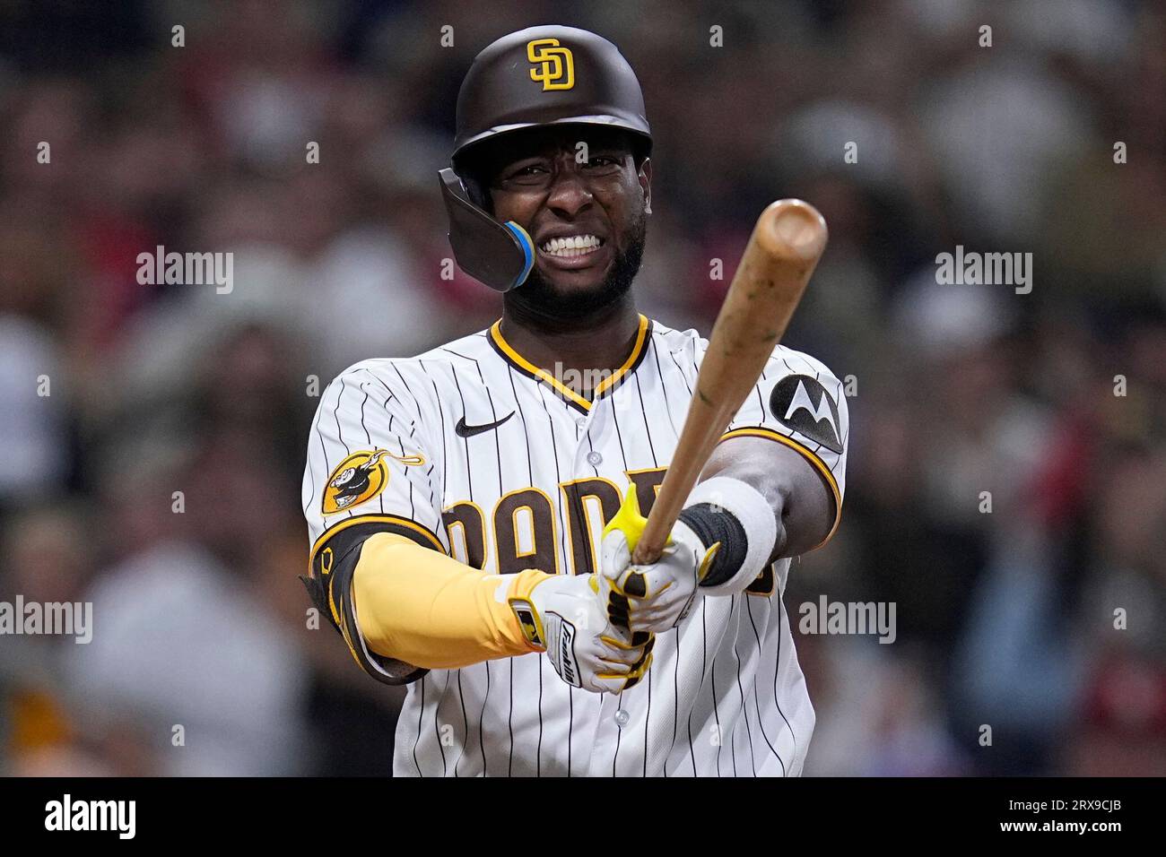 San Diego Padres' Jurickson Profar reacts after a swinging strike ...