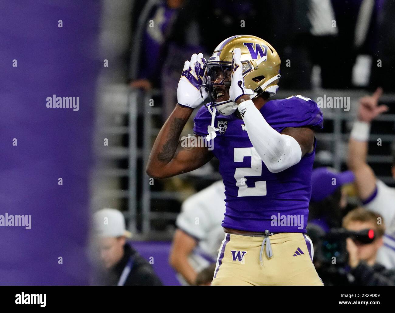 Washington wide receiver Ja'Lynn Polk reacts to his ouchdown against ...