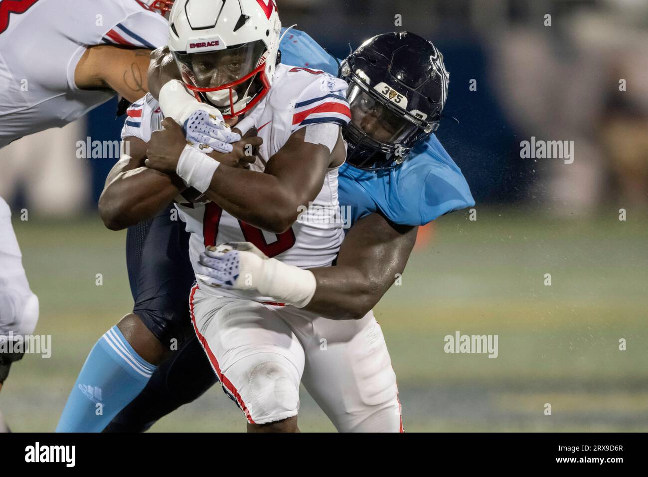 Liberty running back Quinton Cooley (20) runs with the ball and is ...