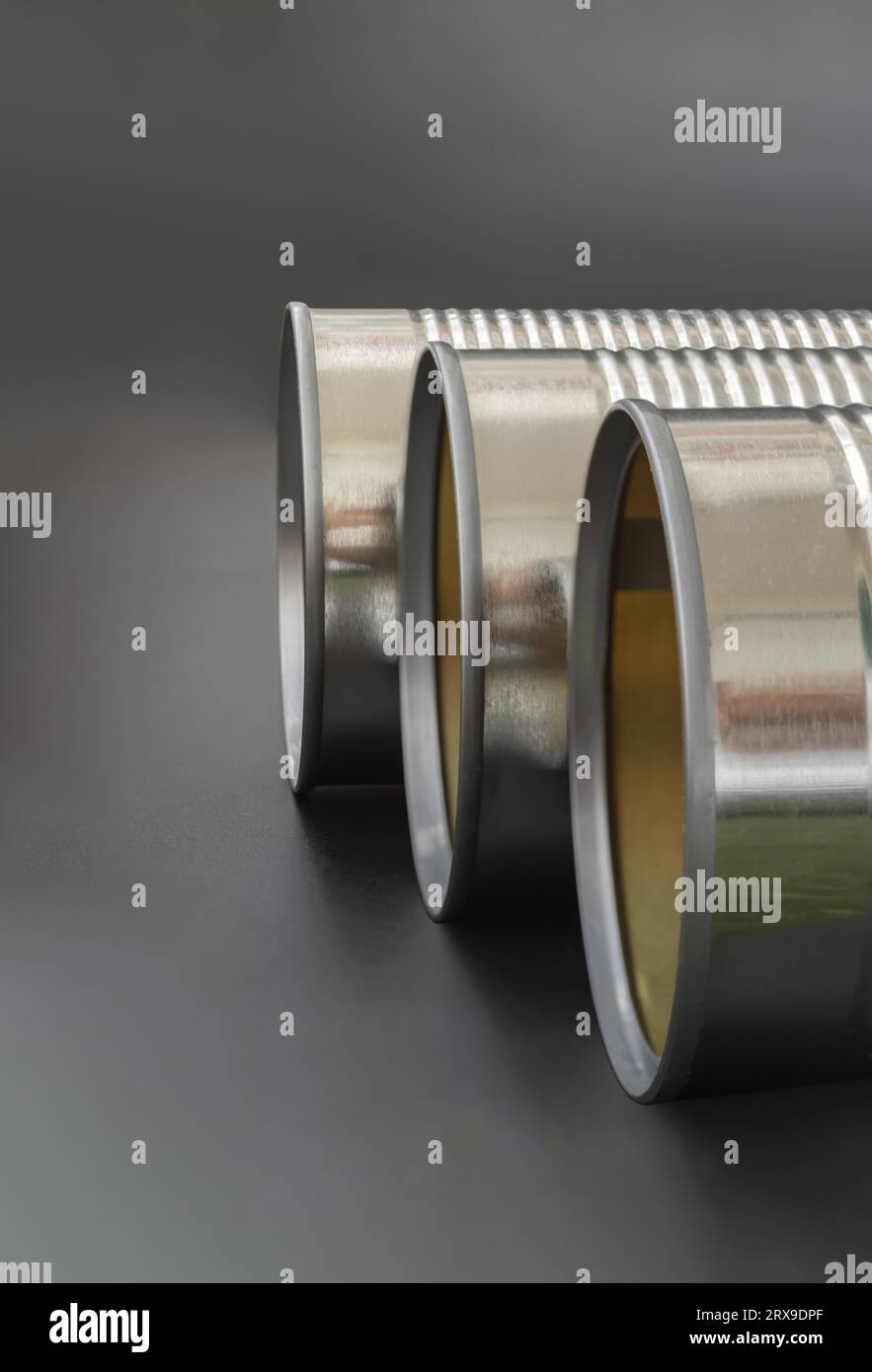 Three open empty opened Steel and tin cans arrange. Metal tin cans on ...