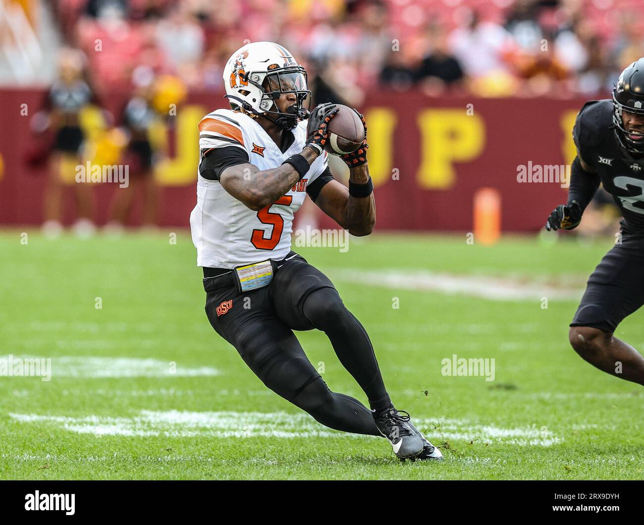 Ames, IA, USA. 23rd Sep, 2023. Oklahoma State's Jaden Bray (5) catches ...