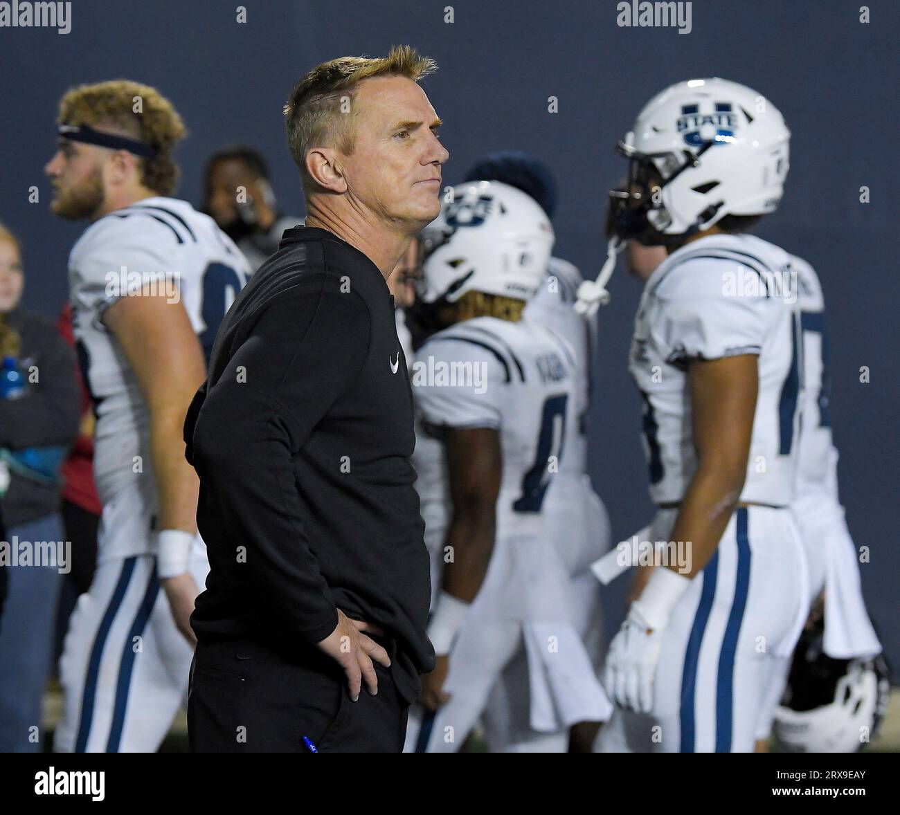 Utah State head coach Blake Anderson watches as players walk off the ...