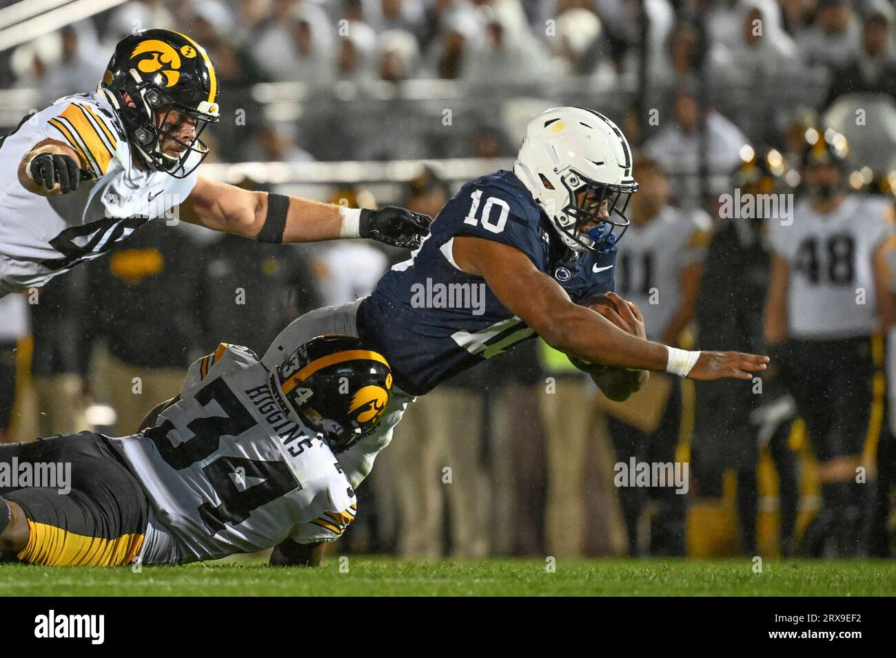 Penn State Running Back Nicholas Singleton 10 Is Tackled By Iowa Linebacker Jay Higgins 34 4420