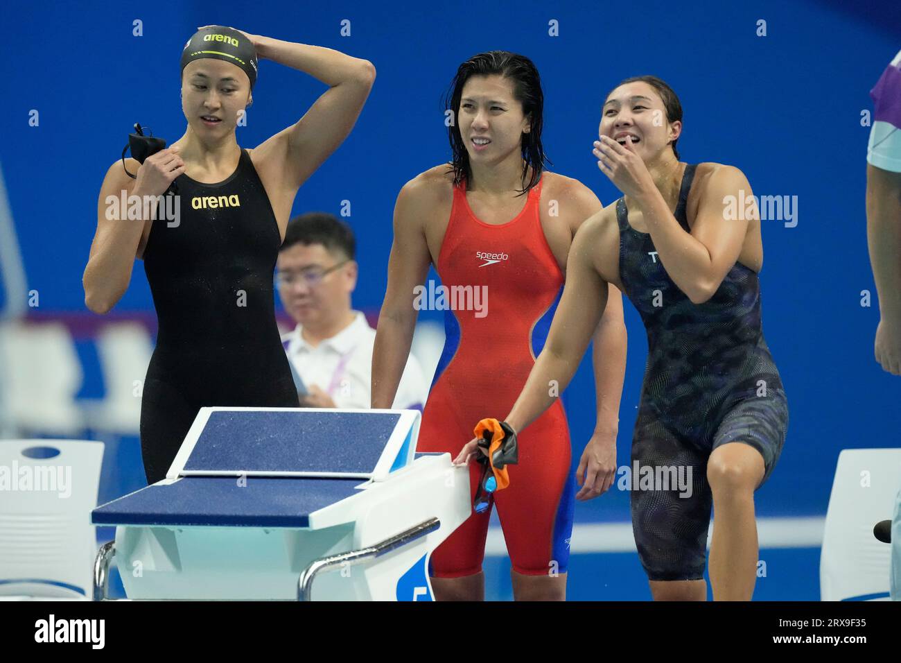 Team Singapore reacts during the women's 4x100 meter freestyle relay ...