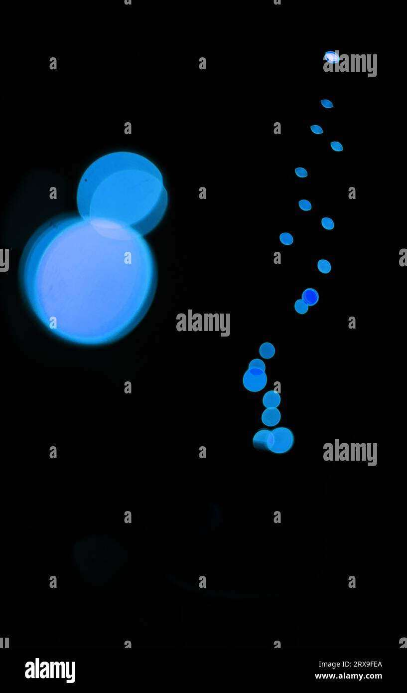 Bokeh, blue lights and dark wallpaper with pattern, texture and dots on mockup with cosmic ...