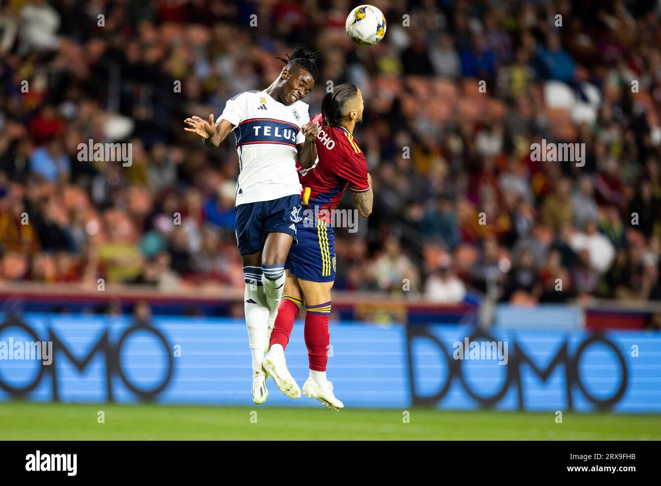 Vancouver Whitecaps' Sam Adekugbe, left, and Real Salt Lake's Cristian ...