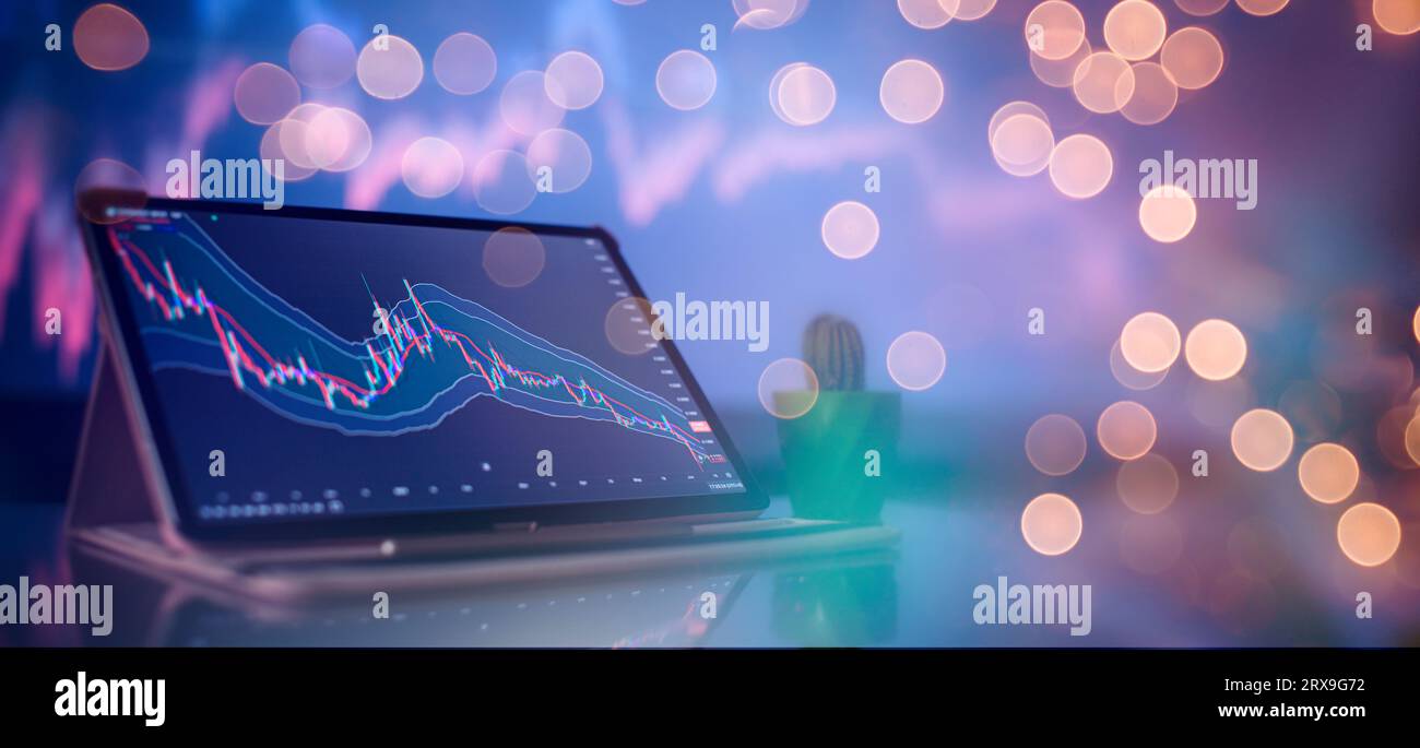 Analysis of financial charts on the screen. Asset Investment Chart ...