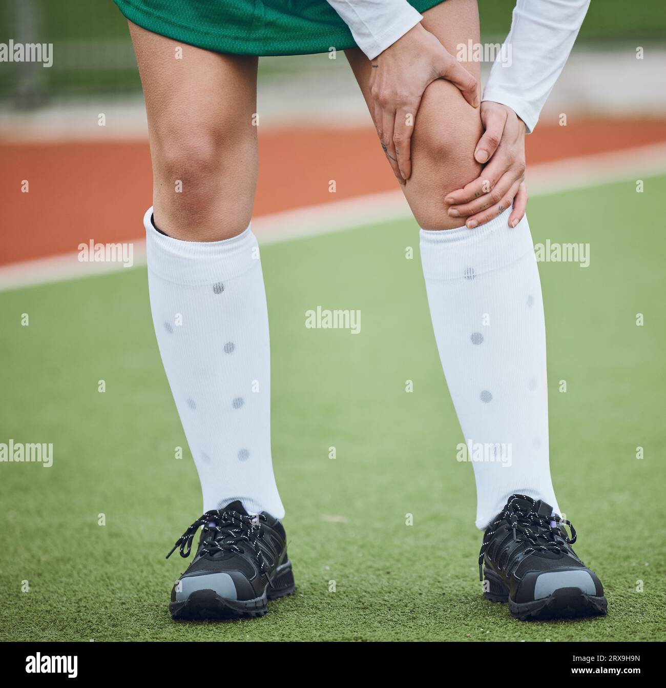 Sports, injury and legs of woman on field, grass or athlete walking ...