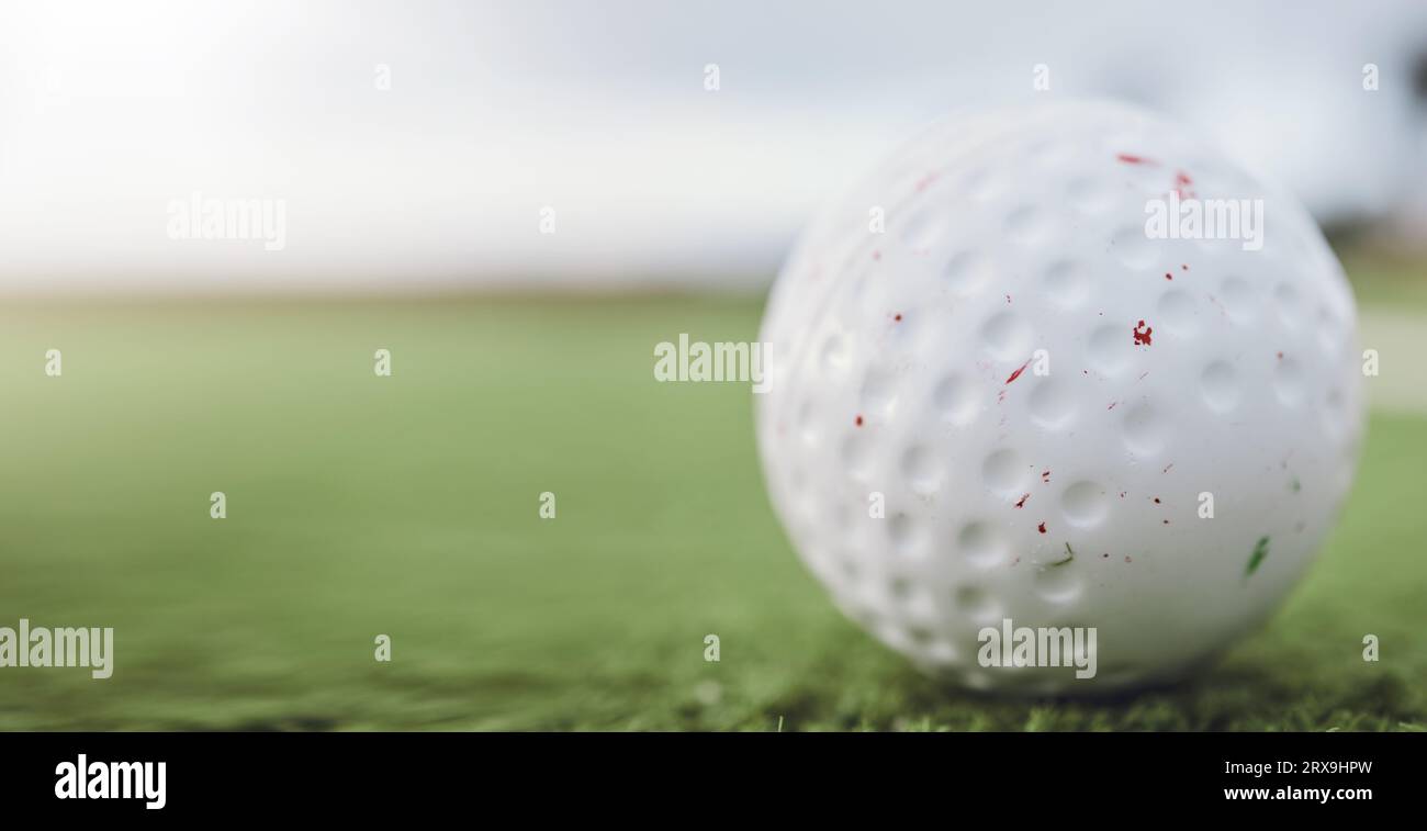 Sports, hockey and ball on astro turf closeup with space for marketing ...