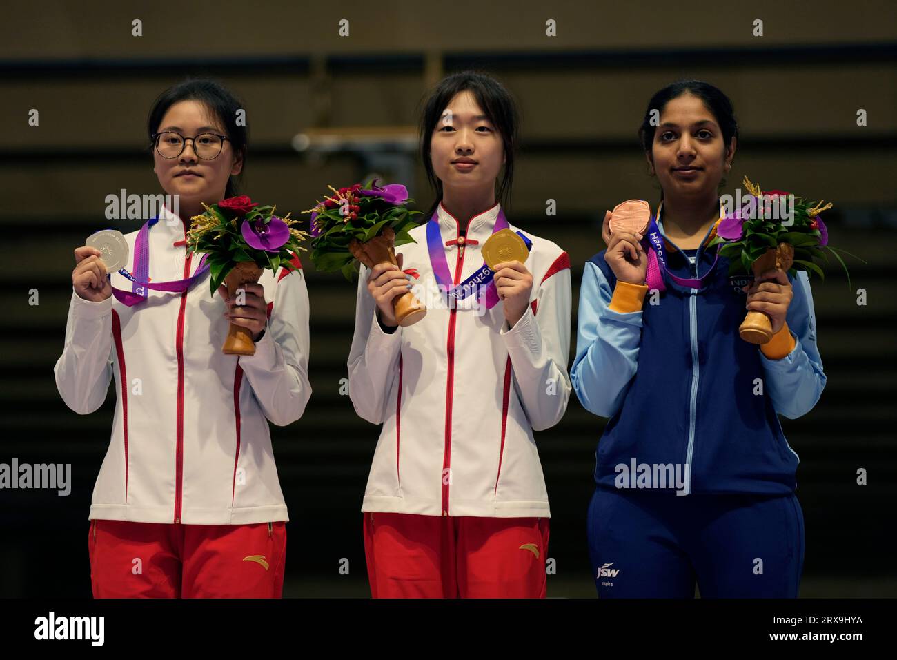Gold medalist China's Yuting Huang, center, silver medalist China's ...