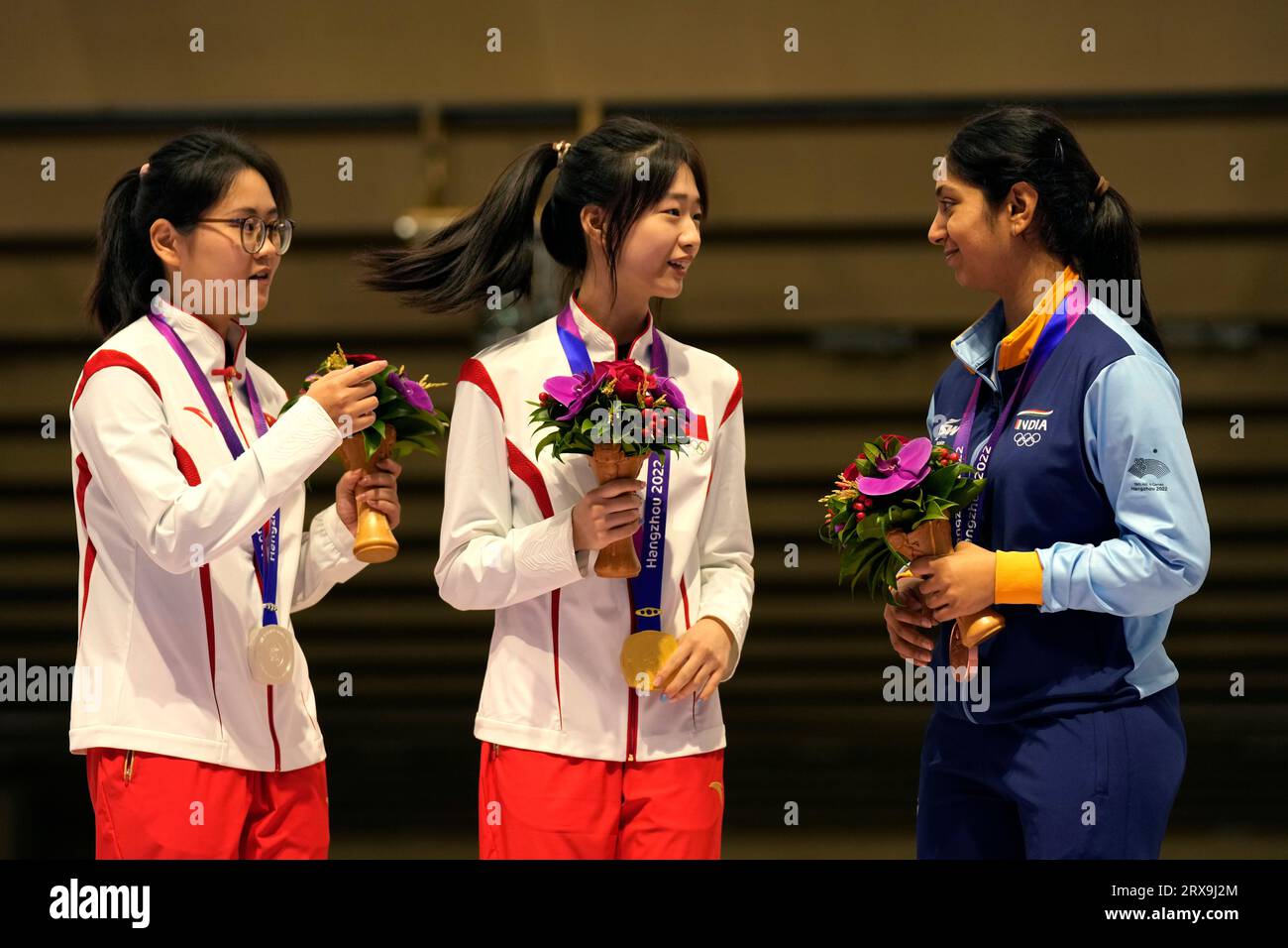 Gold medalist China's Yuting Huang, center, silver medalist China's ...