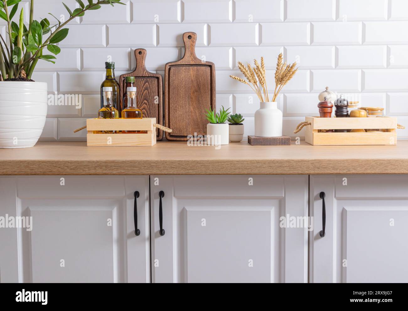 Front view of the kitchen wooden countertop with storage area for oil ...