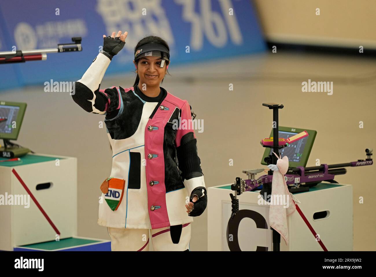 India's Ramita reacts after winning bronze in the women's 10-meter air ...