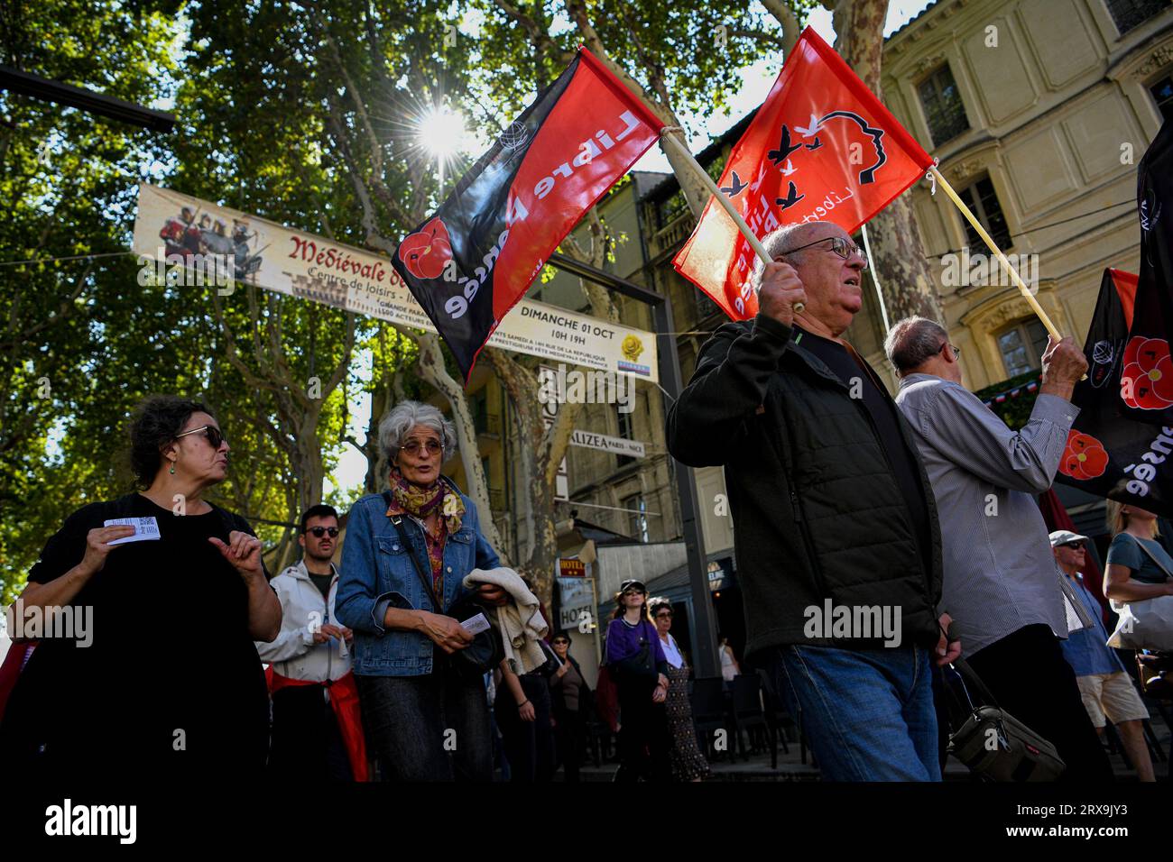 Avignon, France. 23rd Sep, 2023. Protesters are seen with flags during ...
