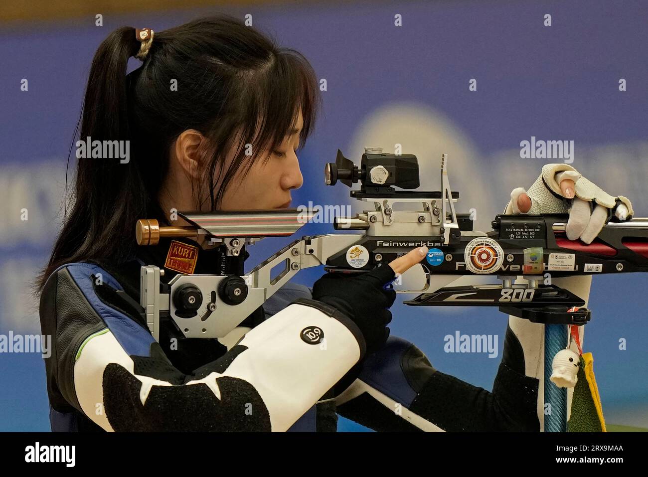 Yuting Huang of China pauses during the women's 10-meter air rifle ...