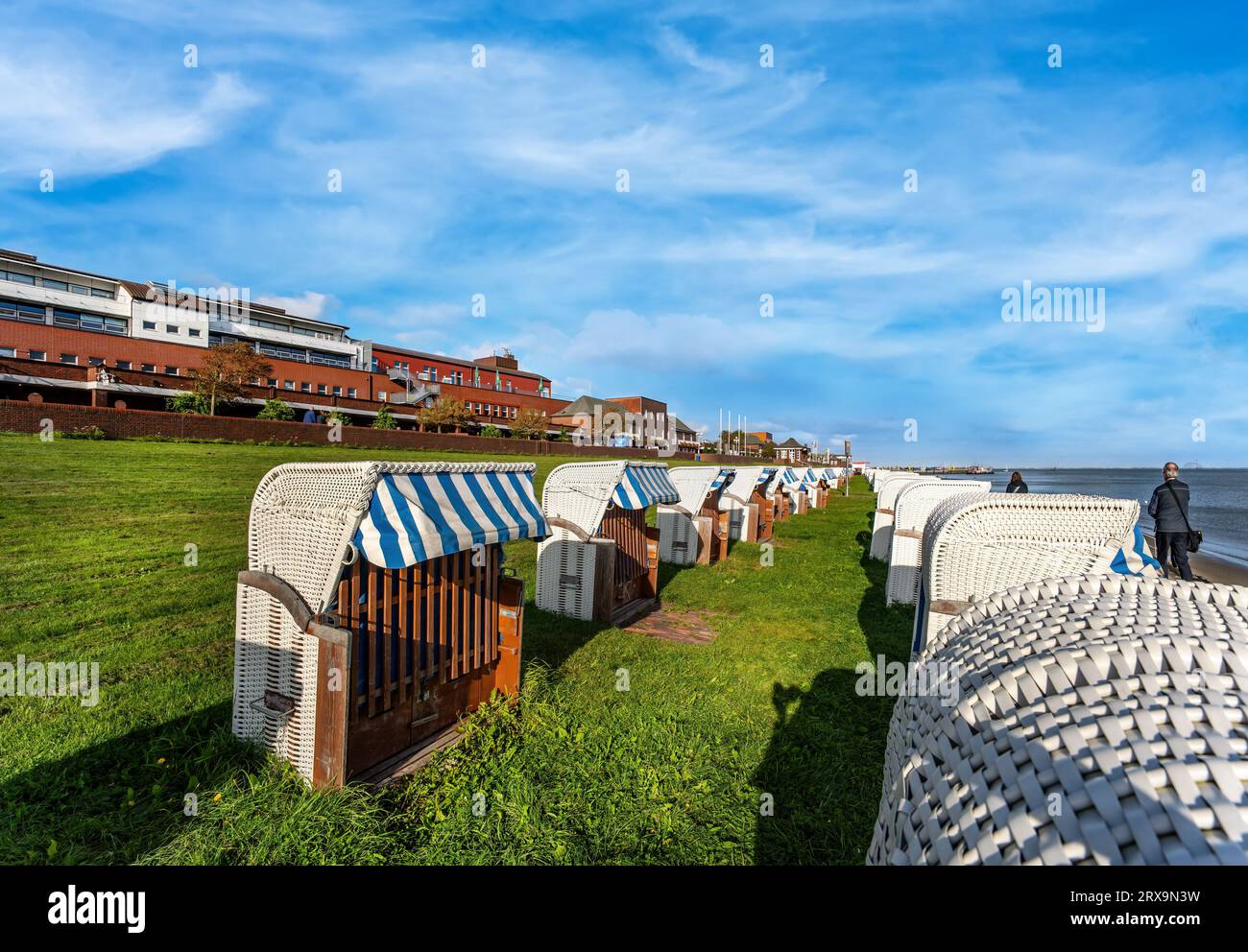 Beach with beach chairs and dike at the south beach in Wilhelmshaven ...