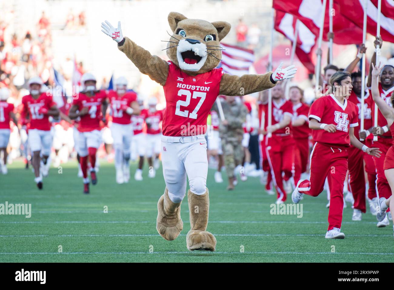 Houston, TX, USA. 23rd Sep, 2023. Houston Cougars mascot Shasta leads ...