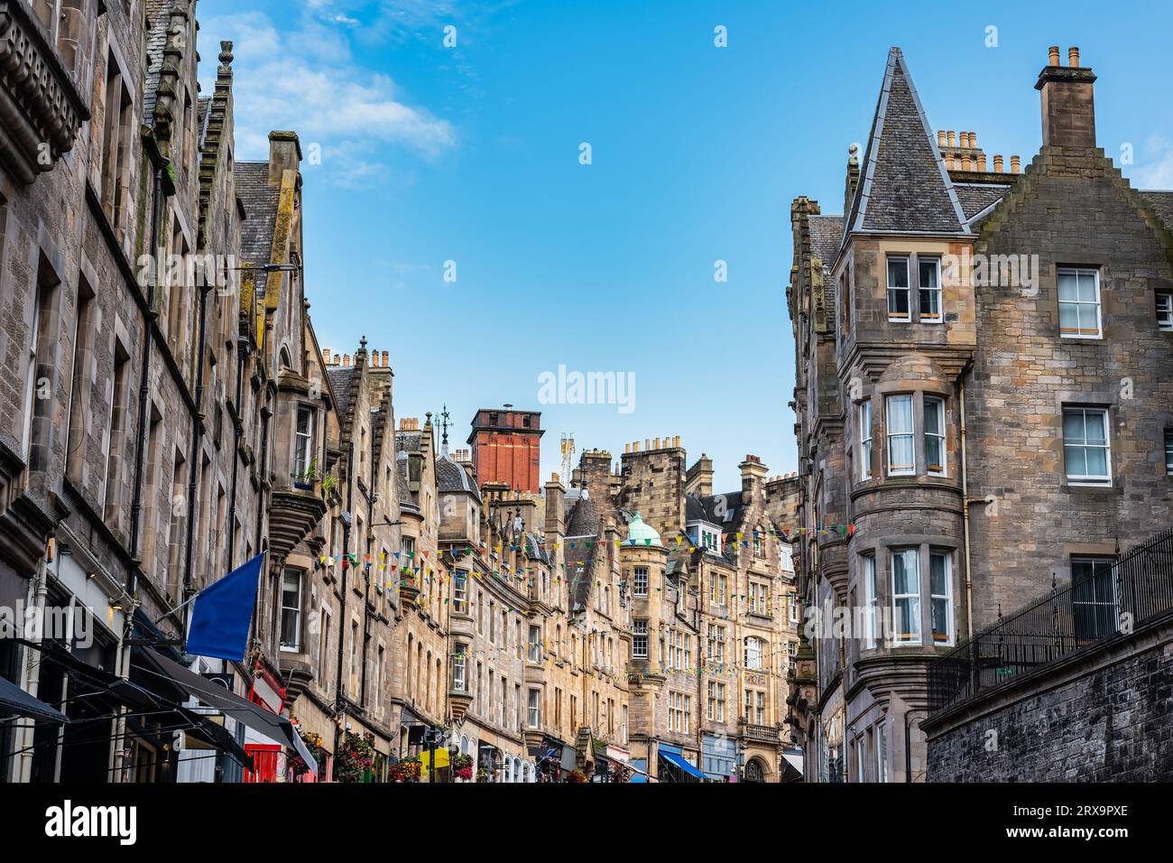 Beautiful ancient stone buildings on Cockburn Street in central ...