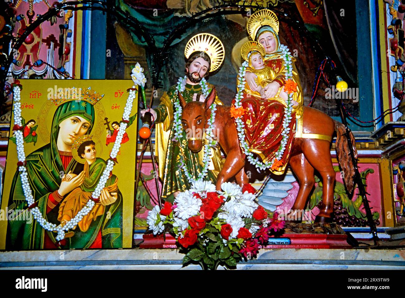 Church altar decoration with the Holy Family, Kerala, India Stock Photo ...