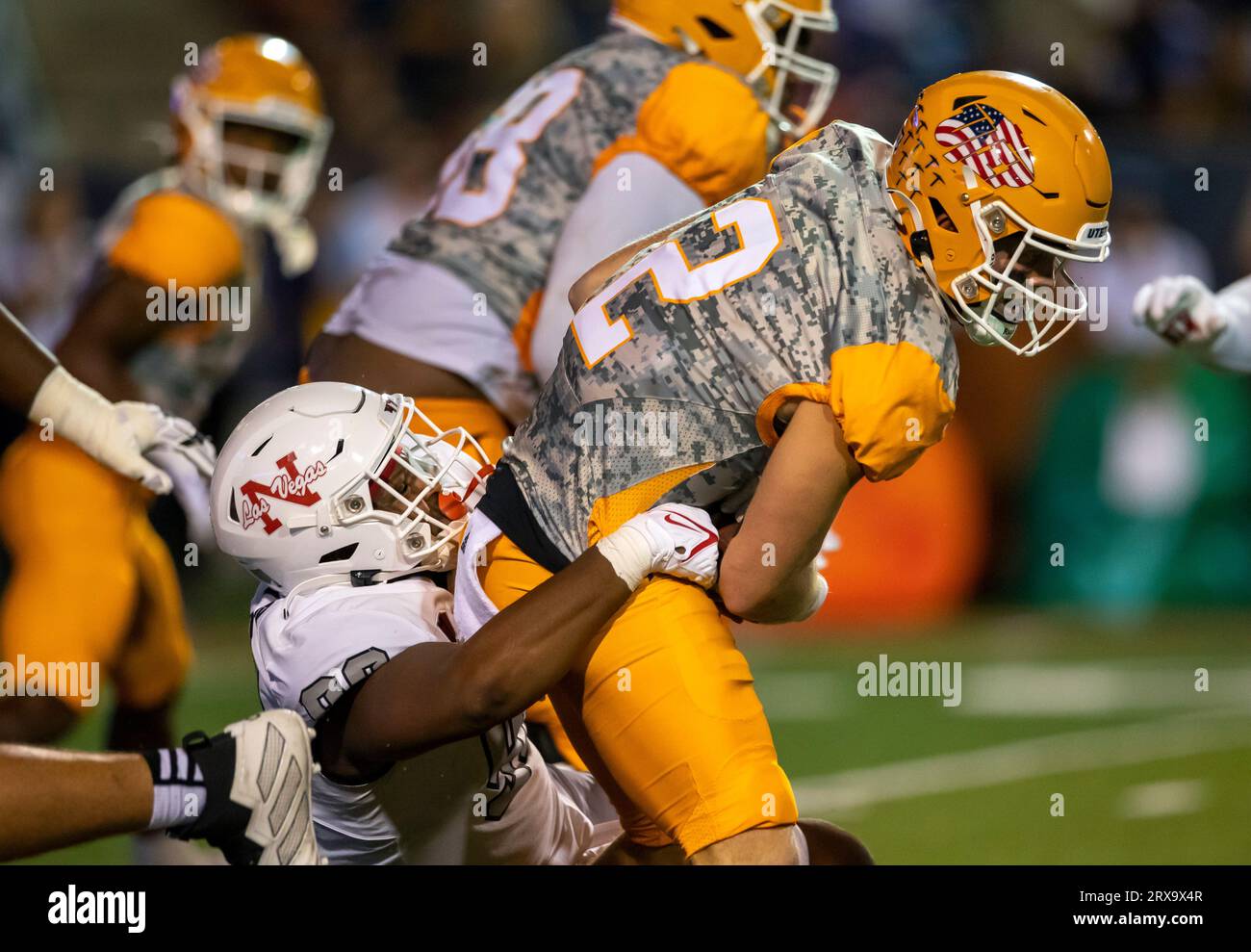 UTEP quarterback Gavin Hardison (2) is sacked by UNLV defensive lineman ...