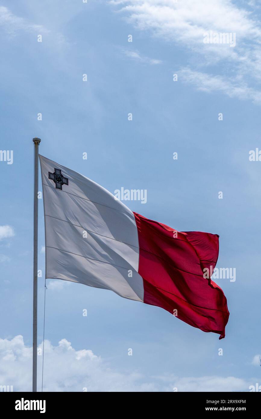 Valletta, Malta, May 1, 2023. The national flag of Malta consists of ...